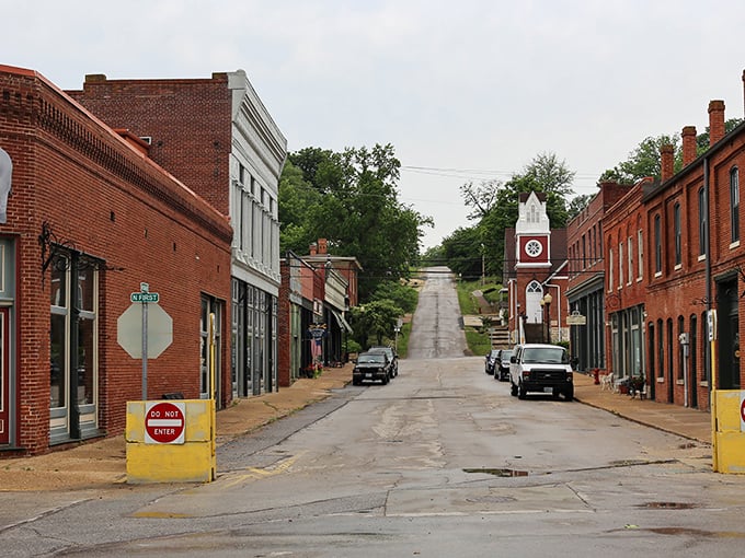 Clarksville's main street stretches toward the horizon with the kind of unassuming charm that never makes it to travel magazines but always makes it to your heart.