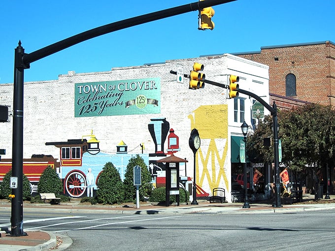 All aboard the mural express! Clover's vibrant train artwork transforms a simple brick wall into a celebration of local heritage.