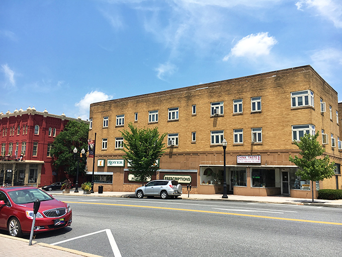 Classic brick architecture meets mountain backdrop - when towns were built to last and actually did.