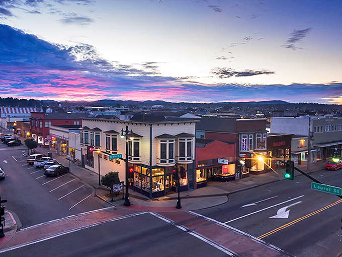 Evening lights twinkle in downtown Fort Bragg, illuminating a Gold Country gem where retirement dollars shine brighter too.