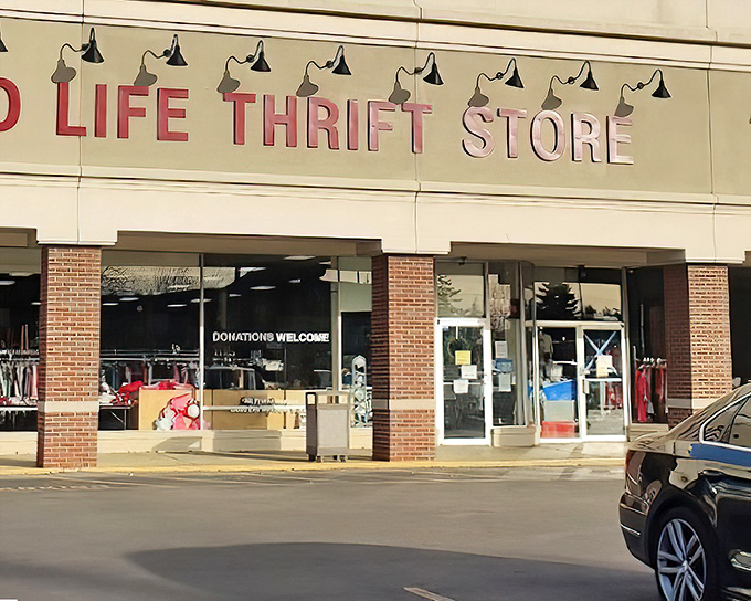 Good Life Thrift Store's straightforward signage and brick facade promise no-nonsense bargain hunting for practical shoppers.
