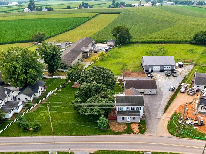 Rolling farmland stretches to the horizon, showcasing the patchwork quilt of fields that feed a nation.