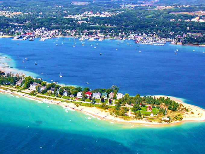 Harbor Springs: Bird's eye view of paradise where forest-lined shores embrace waters so blue they look like liquid sapphires.