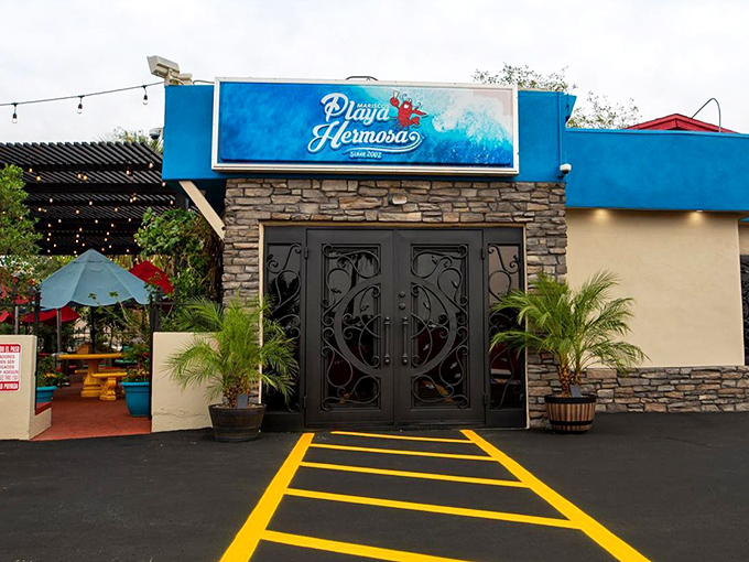 Mariscos Playa Hermosa's stone facade and elegant doors create instant vacation vibes. This Phoenix spot transports you to a Mexican coastal retreat.