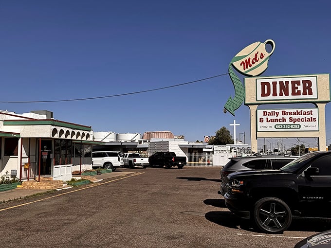 Mel's distinctive coffee cup sign has been winking at Grand Avenue travelers for years, promising mugs filled to the brim.