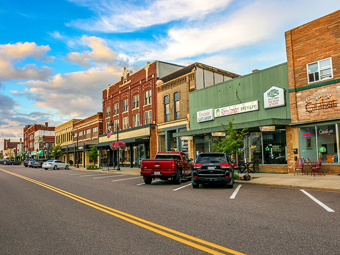 Rhinelander's colorful downtown streets bloom with charm and affordability. When housing costs drop, suddenly life feels more vibrant!