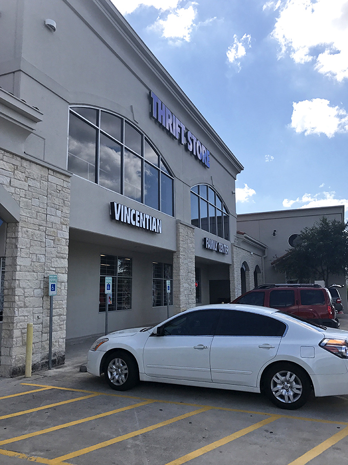 Stone columns and arched windows give St. Vincent de Paul's thrift store an almost regal quality among secondhand shops.