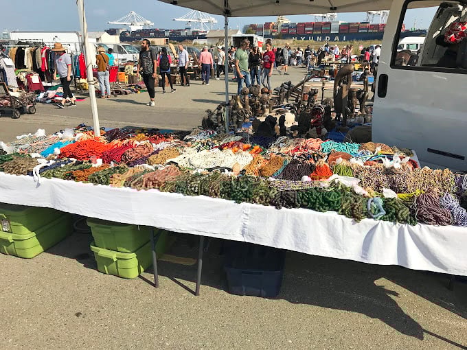 Waterfront browsing at its finest &ndash; where else can you shop for treasures with container ships as backdrop?