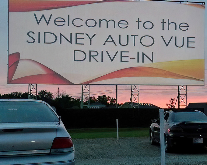 Cars line up at the entrance, each filled with families creating memories that will last far longer than the movie.