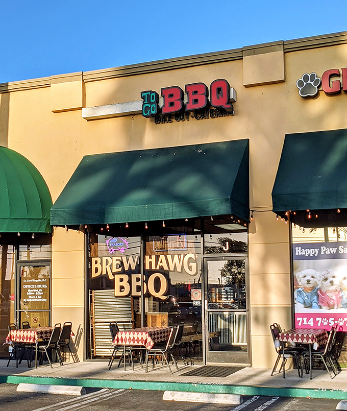 Red checkered tablecloths and outdoor seating hint at the down-home BBQ experience waiting at this Orange County gem.