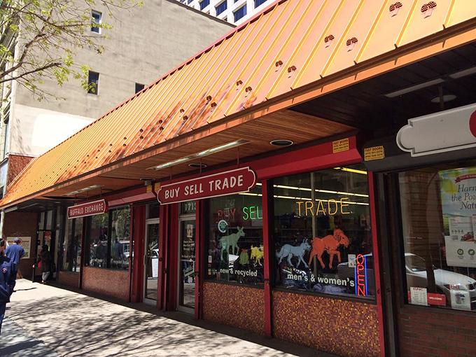 The copper-toned awning of Buffalo Exchange adds vintage flair to this buy-sell-trade fashion destination. Secondhand shopping with first-class style!