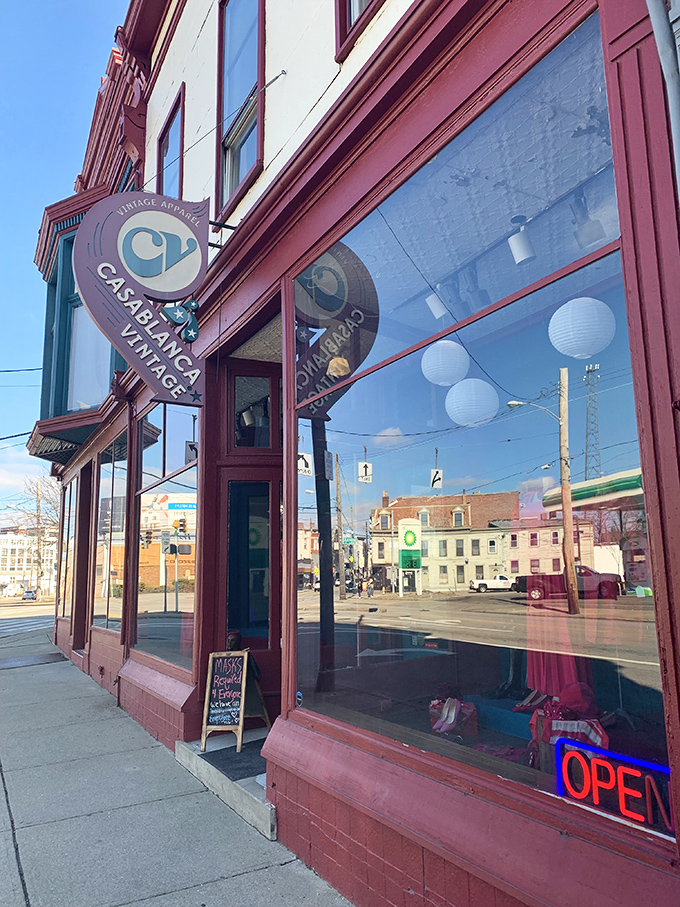 The charming bay window displays vintage mannequins that seem to whisper, "Come inside for a trip through time."