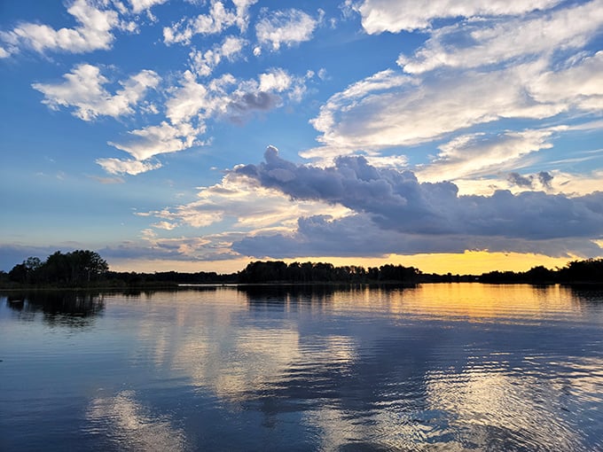 A stunning sunset over Crescent Lake showcases the natural beauty available to residents of these affordable Florida towns.