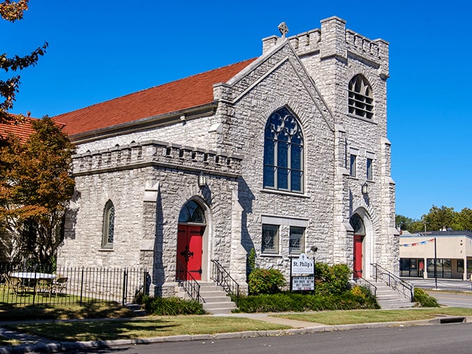 Stone sanctuary with red doors: St. Philip's Episcopal welcomes all souls seeking peace and community.