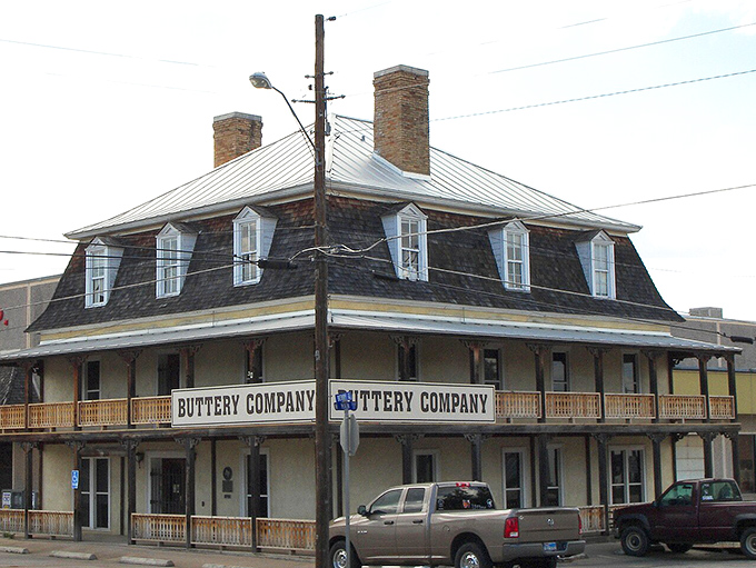 Llano's historic stone buildings line the street like architectural elders, sharing wisdom through their weathered facades.