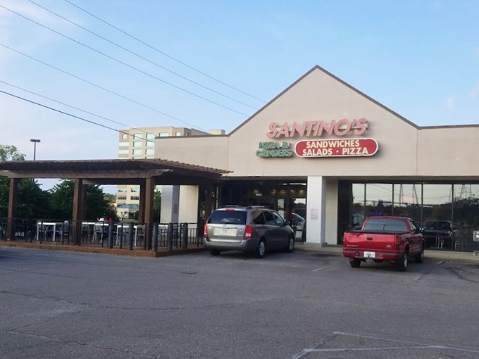 That covered entrance promises shelter from Florida storms and mediocre pizza alike.
