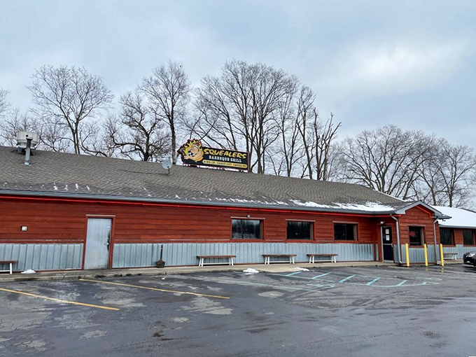 That happy pig on the sign isn't just cute&mdash;it's making a bold promise about the pork paradise waiting inside this rustic BBQ haven.