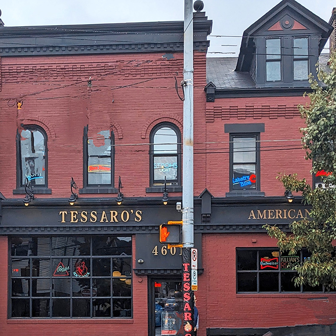 The classic red brick exterior of Tessaro's gives no hint of the smoky, beefy paradise waiting just beyond those doors.