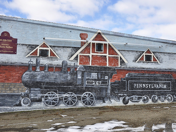 Local murals transform ordinary walls into storytelling canvases celebrating the town's rich railroad heritage.