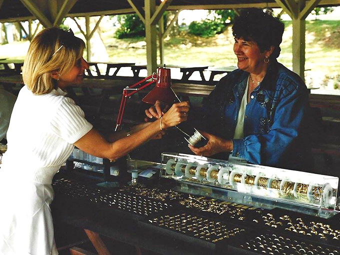 Jewelry and accessories sparkle under tent canopies, transforming simple booths into glittering boutiques of affordable elegance.