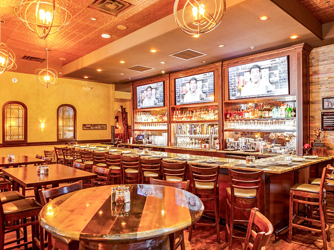 The bar area gleams with bottles and possibilities, a perfect perch for solo diners or those waiting for a table to open in pasta paradise.