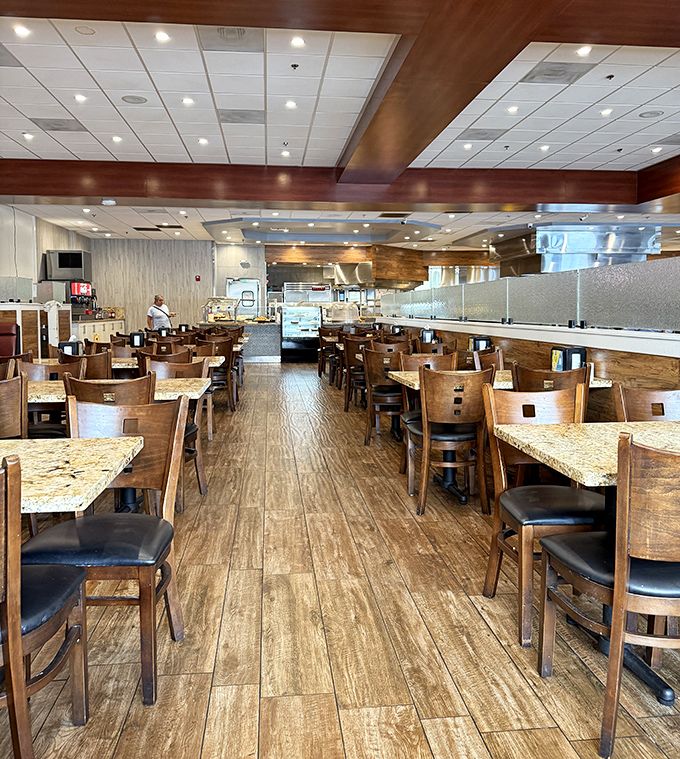 The dining room's wood-toned elegance says, "Yes, you can have seconds AND maintain your dignity." Buffet dining without the cafeteria feel.
