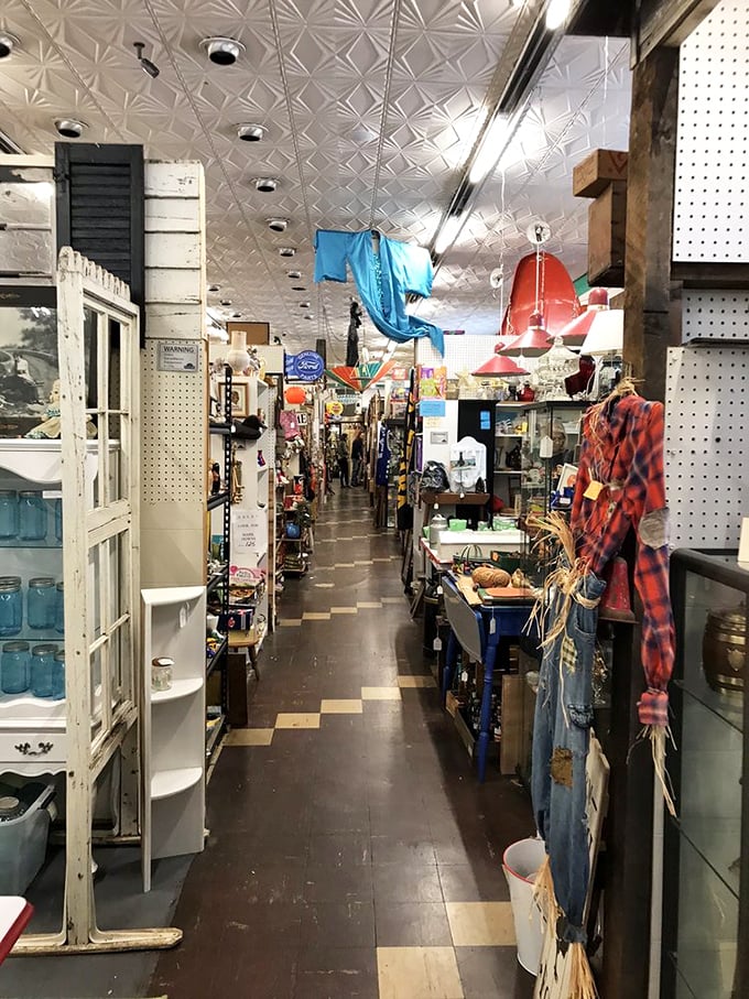Another aisle, another adventure. The checkerboard floor guides you through decades of American material culture, one step at a time.