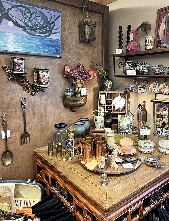 A wooden table laden with copper, porcelain, and possibility—each piece waiting to become the conversation starter in your home.