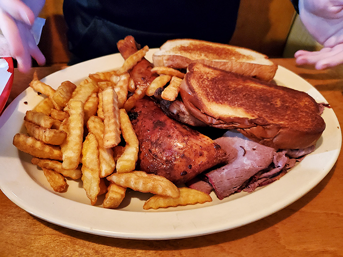 A plate that says "you won't need dinner tonight." The sandwich-meat-fries trinity that's converted more vegetarians than any religious text.