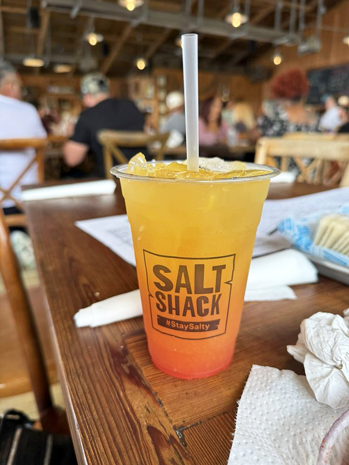 The Bahama Mama—a sunset in a cup that transitions from golden yellow to fiery orange. Drinking the view while enjoying it.
