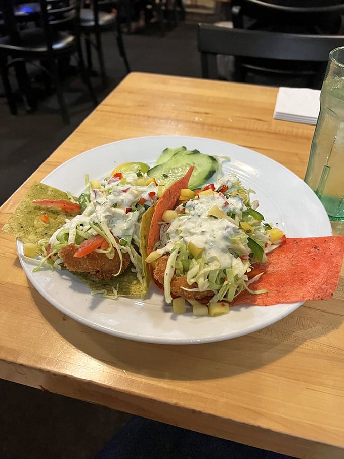 Technicolor tacos that taste like a beach vacation. These Baja fish creations bring coastal magic to the desert, no passport required.