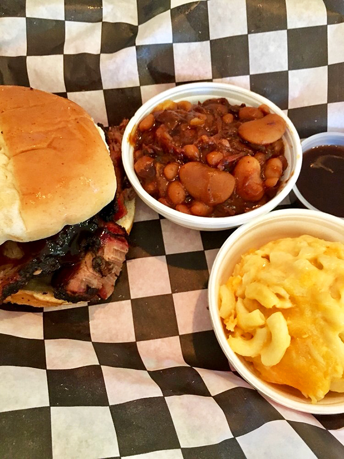 A barbecue sandwich flanked by mac and cheese and baked beans&mdash;the holy trinity of comfort that makes Monday feel like Saturday.