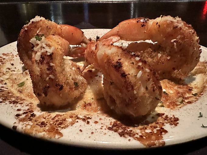Baked shrimp that look like they've been working out &ndash; massive, succulent, and dressed to impress with a dusting of herbs.