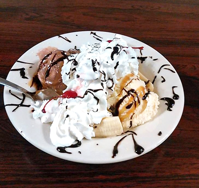 A banana split that doesn't need Instagram filters – just your undivided attention and a willingness to share (though you won't want to).