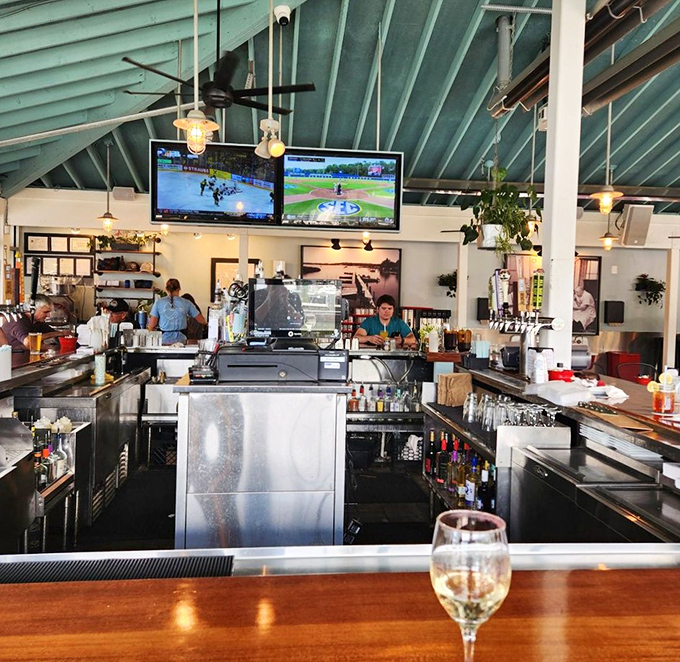 The bar is command central for Orange Crushes and local brews, where bartenders orchestrate the perfect waterfront drinking experience.