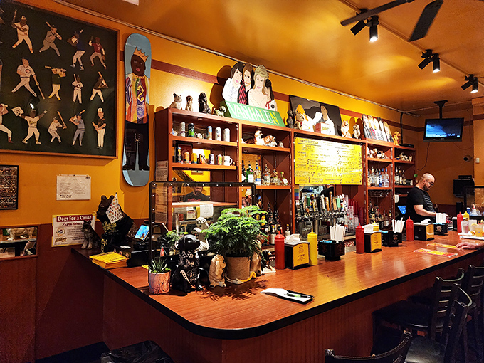 The bar area where cold drinks meet hot dogs in perfect harmony, creating dining room magic.