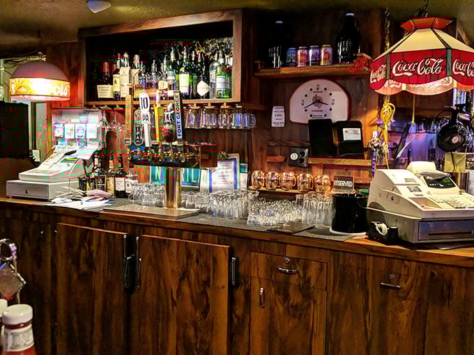 A bar that doesn't need mixologists with waxed mustaches—just solid pours and a surface worn smooth by countless elbows and good conversations.