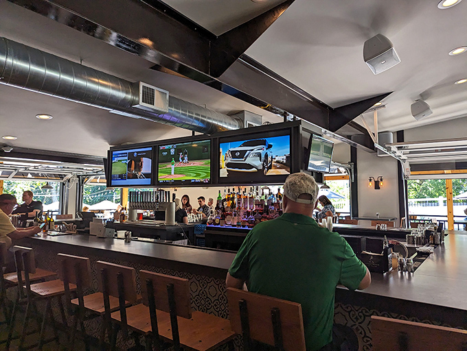 A bar setup that understands the sacred geometry of sports viewing, conversation flow, and optimal drink delivery distance.