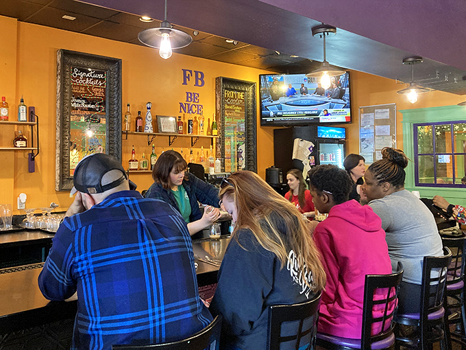 The bar area says "BE NICE" on the wall, but with mimosas and bloody marys flowing, being nice comes naturally here.