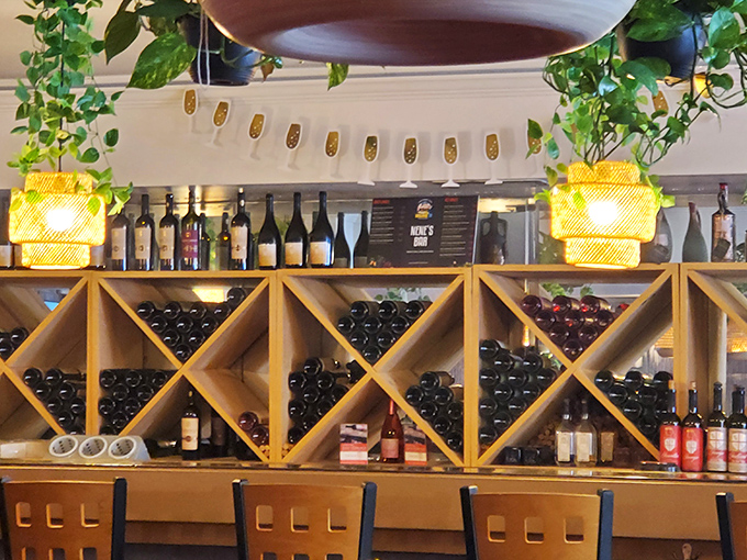 The inviting bar beckons with authentic selections that perfectly complement Eastern European flavors.