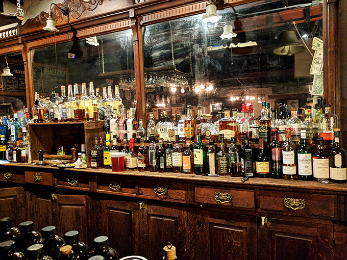 A bar stocked like a liquid library where the bartenders are both scholars and artists of their craft. 