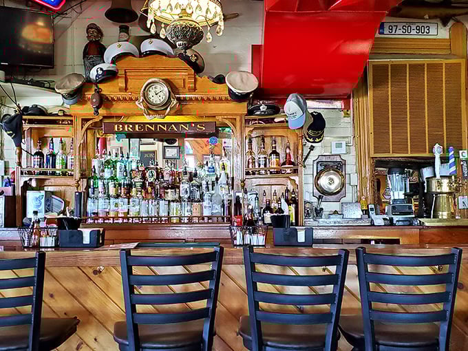 A bar adorned with sailor caps and maritime memorabilia. The perfect spot to swap fish tales while waiting for your actual fish.