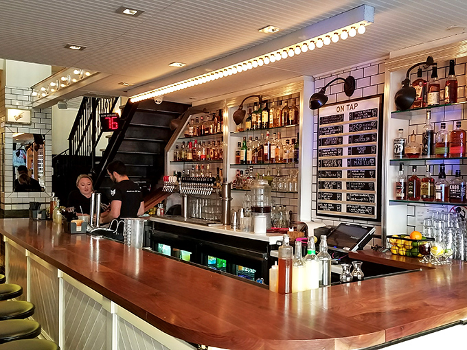 Bottles lined up like soldiers ready for flavor battle. This bar doesn't just serve drinks&mdash;it curates liquid experiences with military precision.