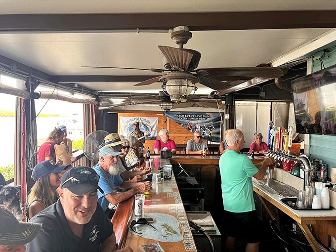 At this bar, every seat feels like the best one in the house, where regulars and tourists find common ground over cold beer and fish tales. 