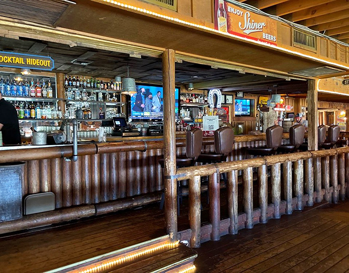 The saloon-style bar where cold beverages meet Western hospitality in perfectly air-conditioned comfort and style.
