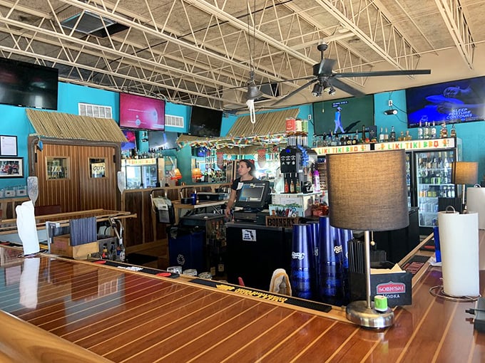 A bar that promises both libation and salvation from the ordinary, with enough screens to never miss a play.