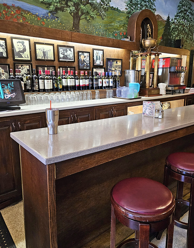 The bar area feels like it's been serving satisfied customers since before your parents' first date, with wood-paneled warmth and Italian countryside murals.