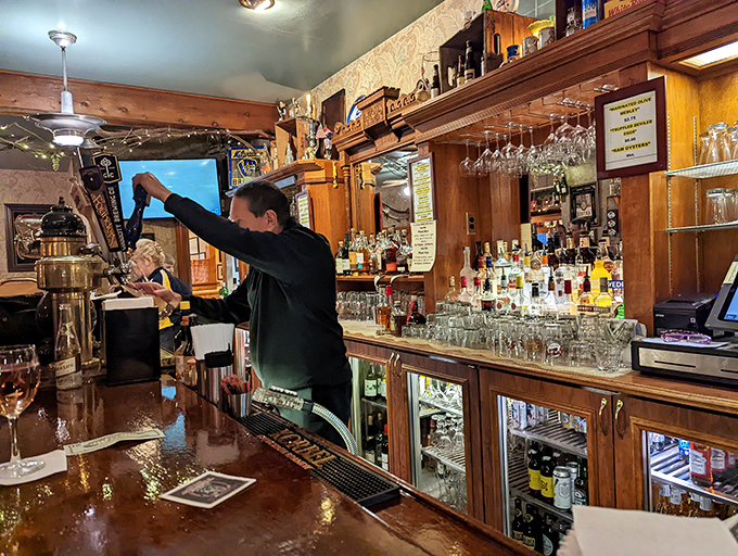 The welcoming bar area where locals gather and visitors quickly become part of the family.