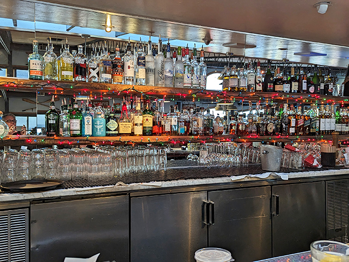 A bar stocked for maritime celebrations – where coastal cocktails are crafted with the precision of a ship's navigator.