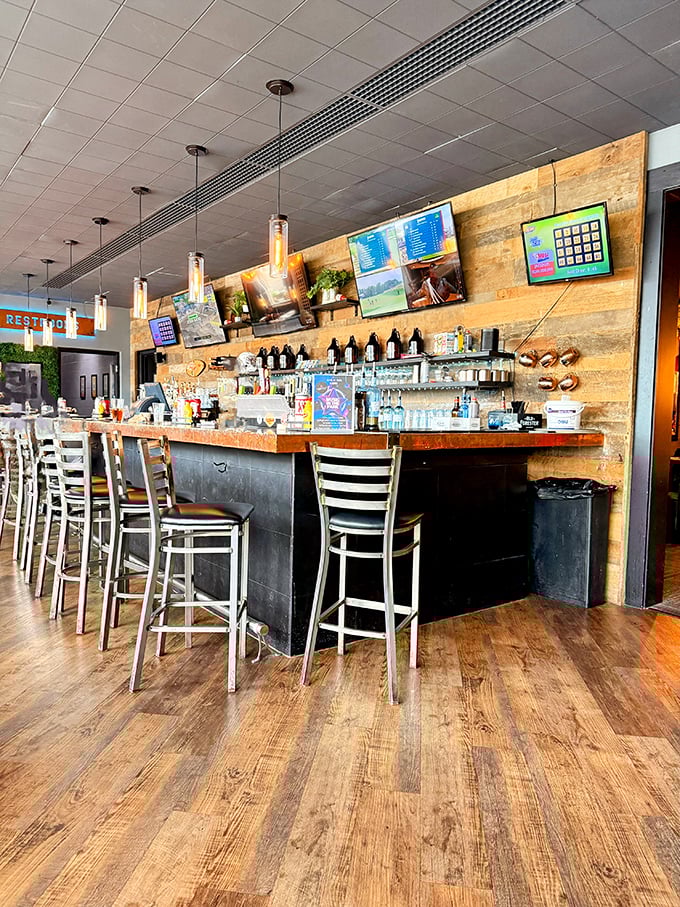 A bar built for conversation, not Instagram&mdash;though the warm wood and pendant lights might tempt you to snap a pic anyway.